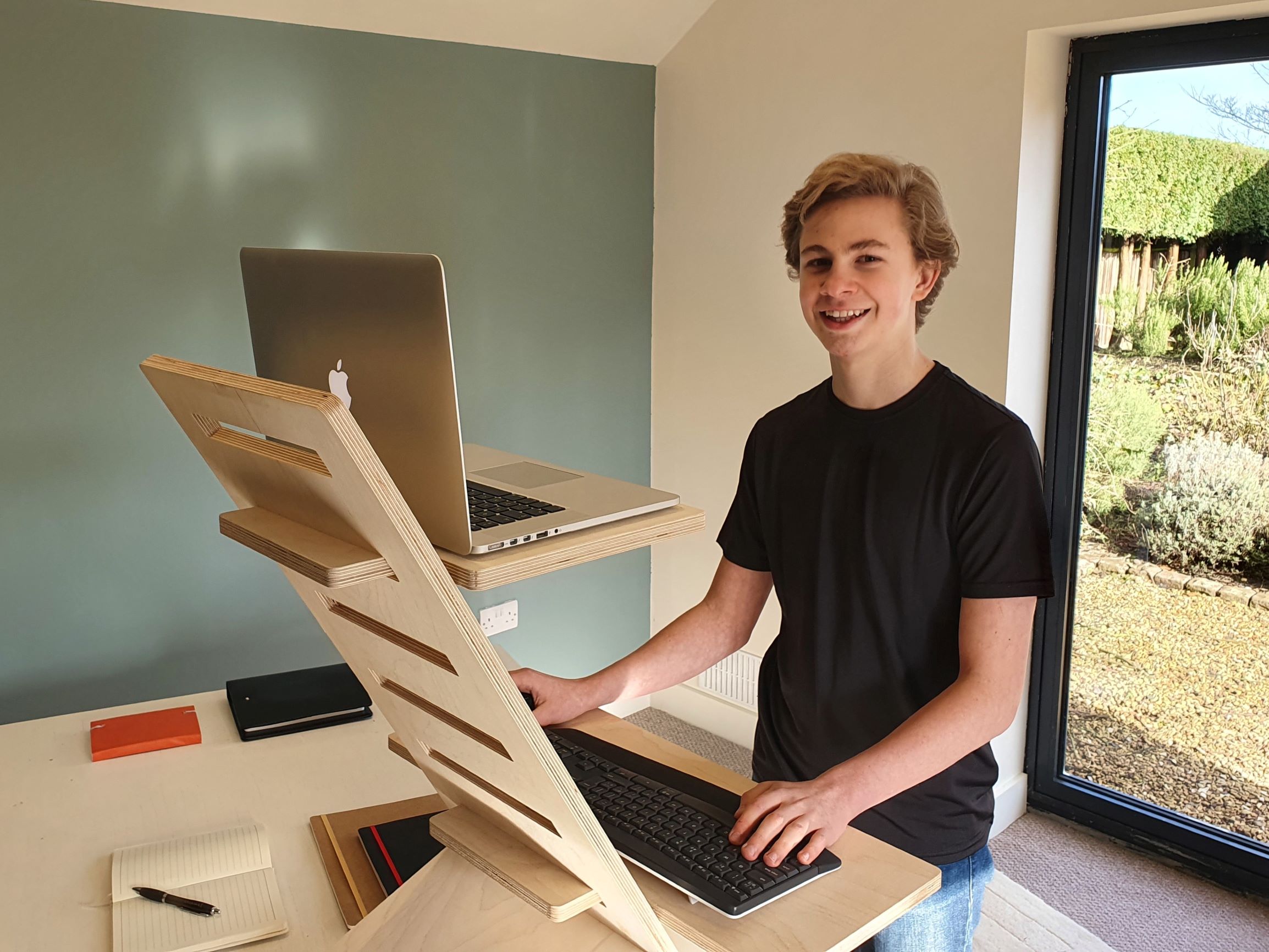 Teenager Adam builds unique standing desks and raises funds for ...